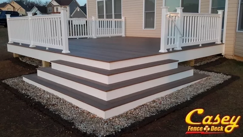 Ground Level Deck with Timbertech Composite and White Monument Railing